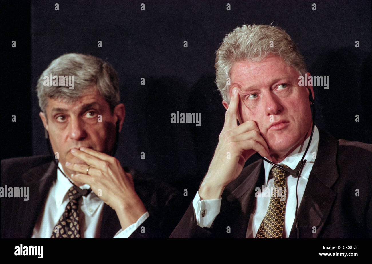 US President Bill Clinton (R) and US Treasury Secretary Robert Rubin ...