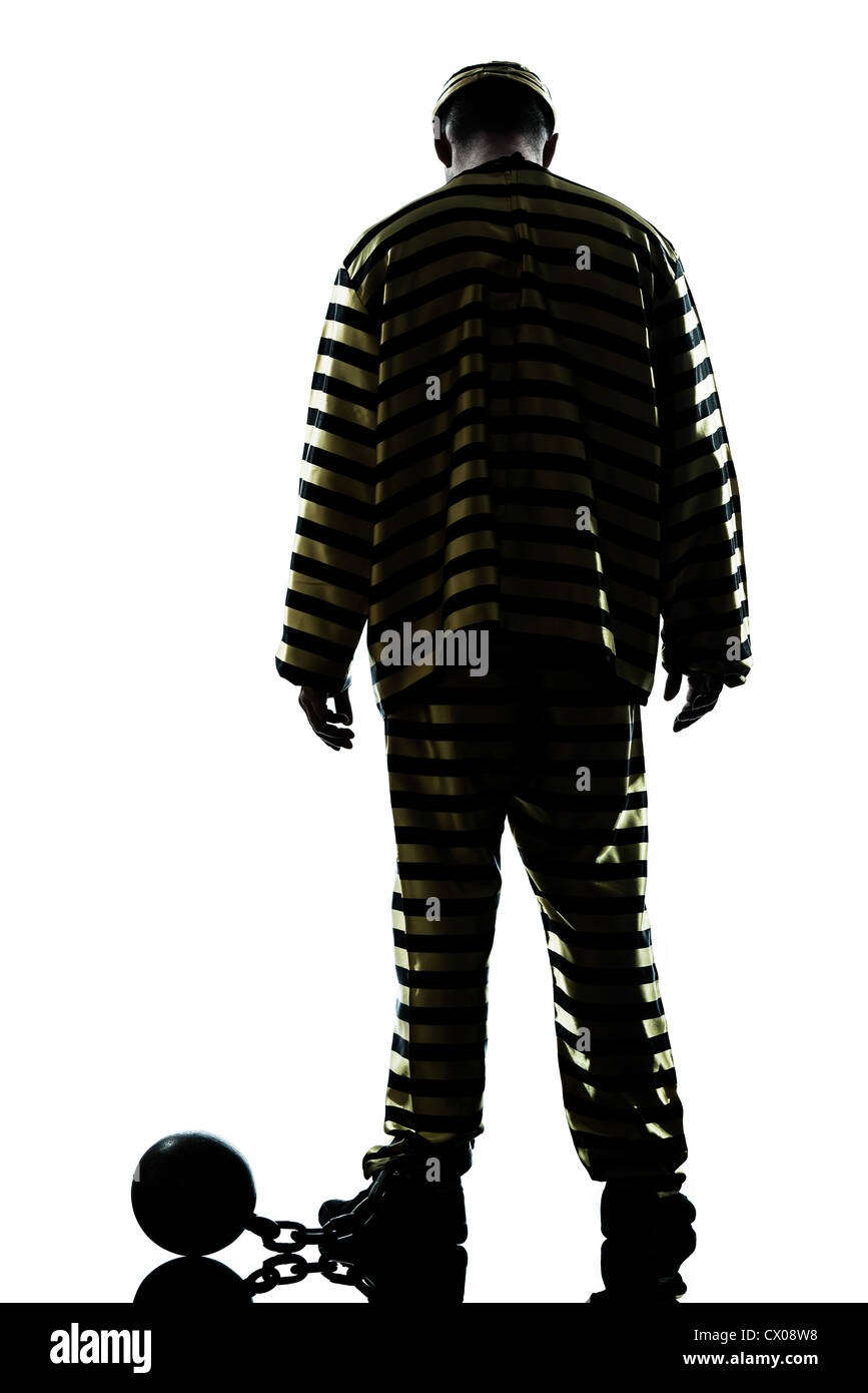 one caucasian man prisoner criminal with chain ball in studio isolated ...