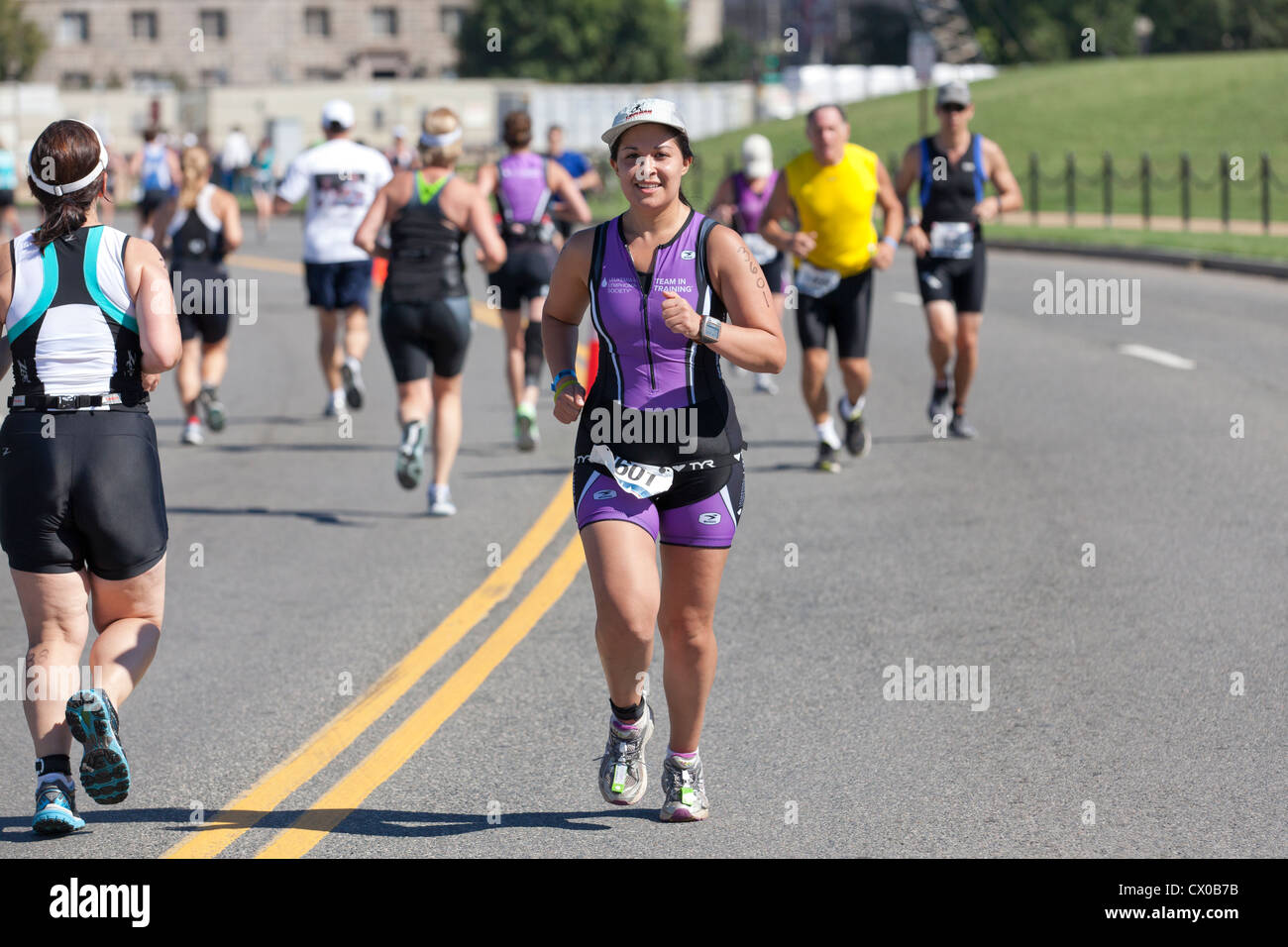 Female racer running in a marathon - USA Stock Photo - Alamy