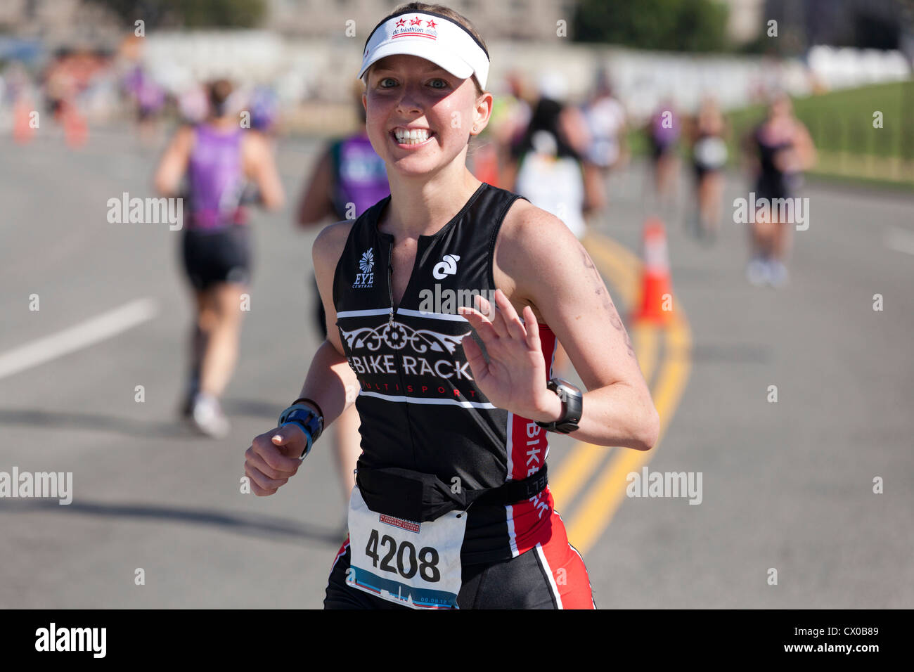 Female racer running in a marathon - USA Stock Photo - Alamy