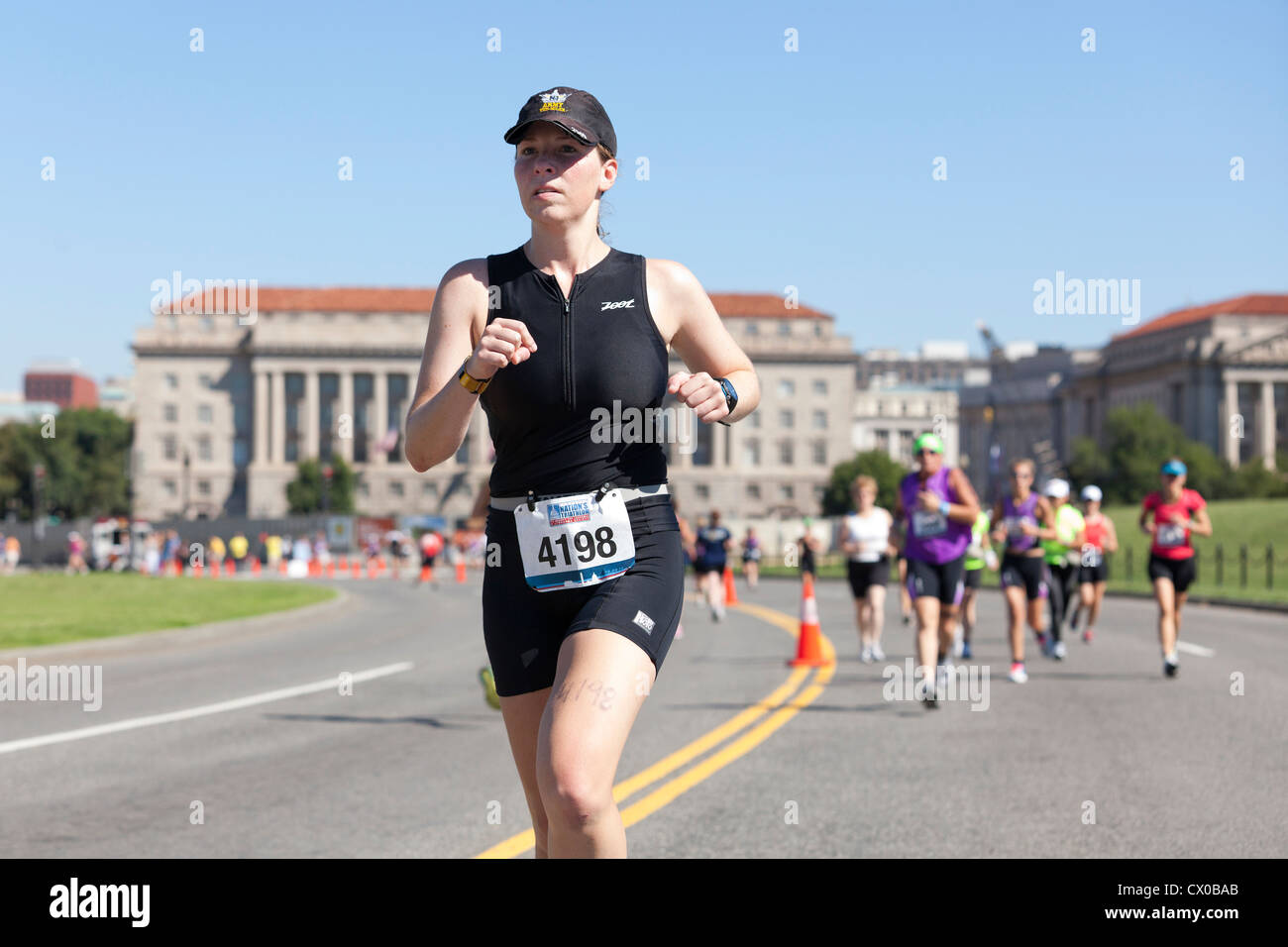 Female racer running in a marathon - USA Stock Photo - Alamy