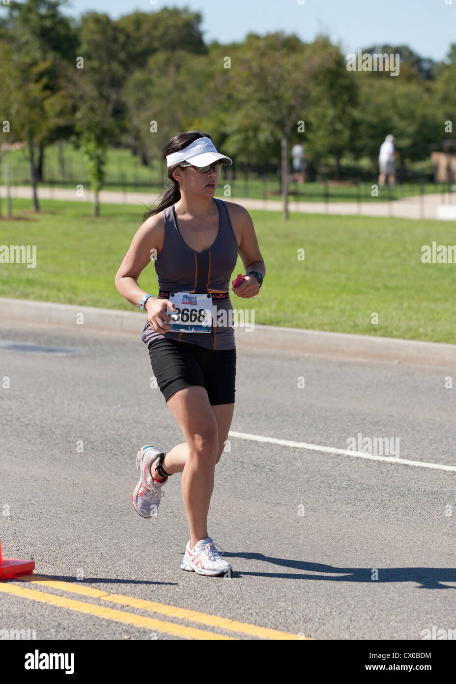 Female racer running in a marathon - USA Stock Photo - Alamy