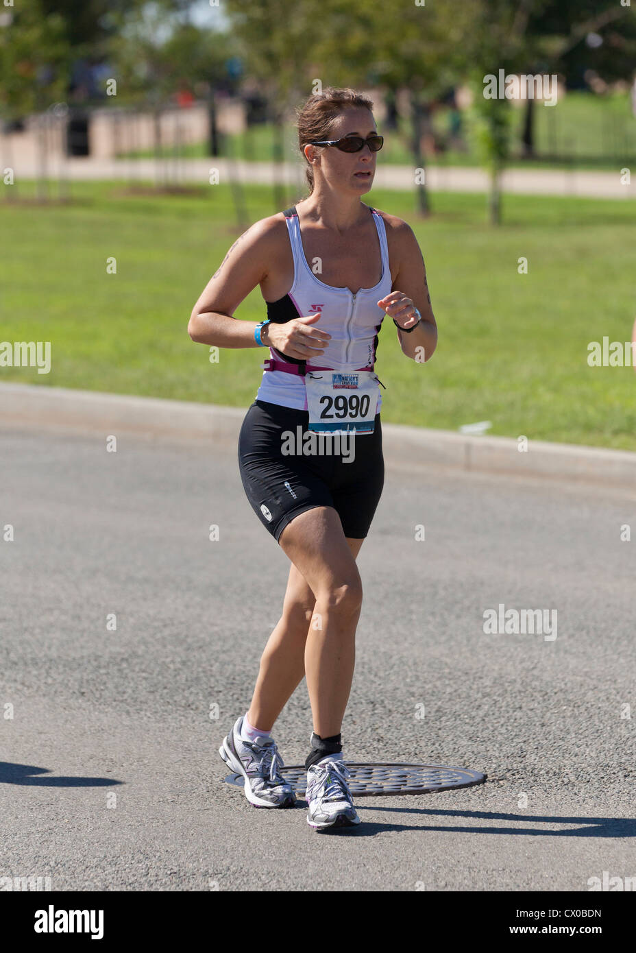 Female racer running in a marathon - USA Stock Photo - Alamy