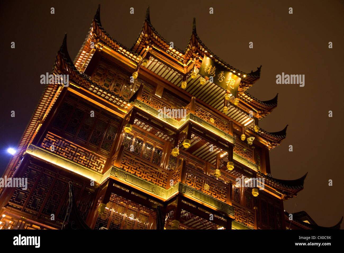 Traditional buildings lit up by night in the old town center of the ...