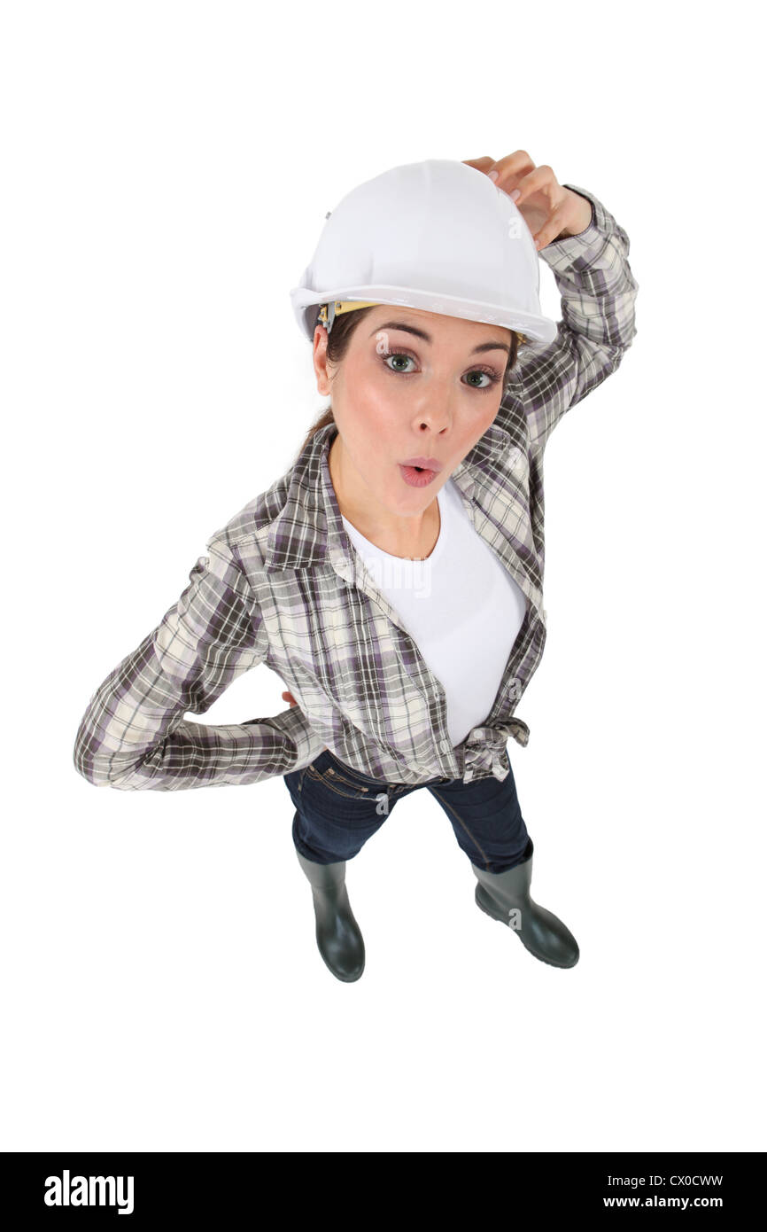 Confused female construction worker Stock Photo - Alamy