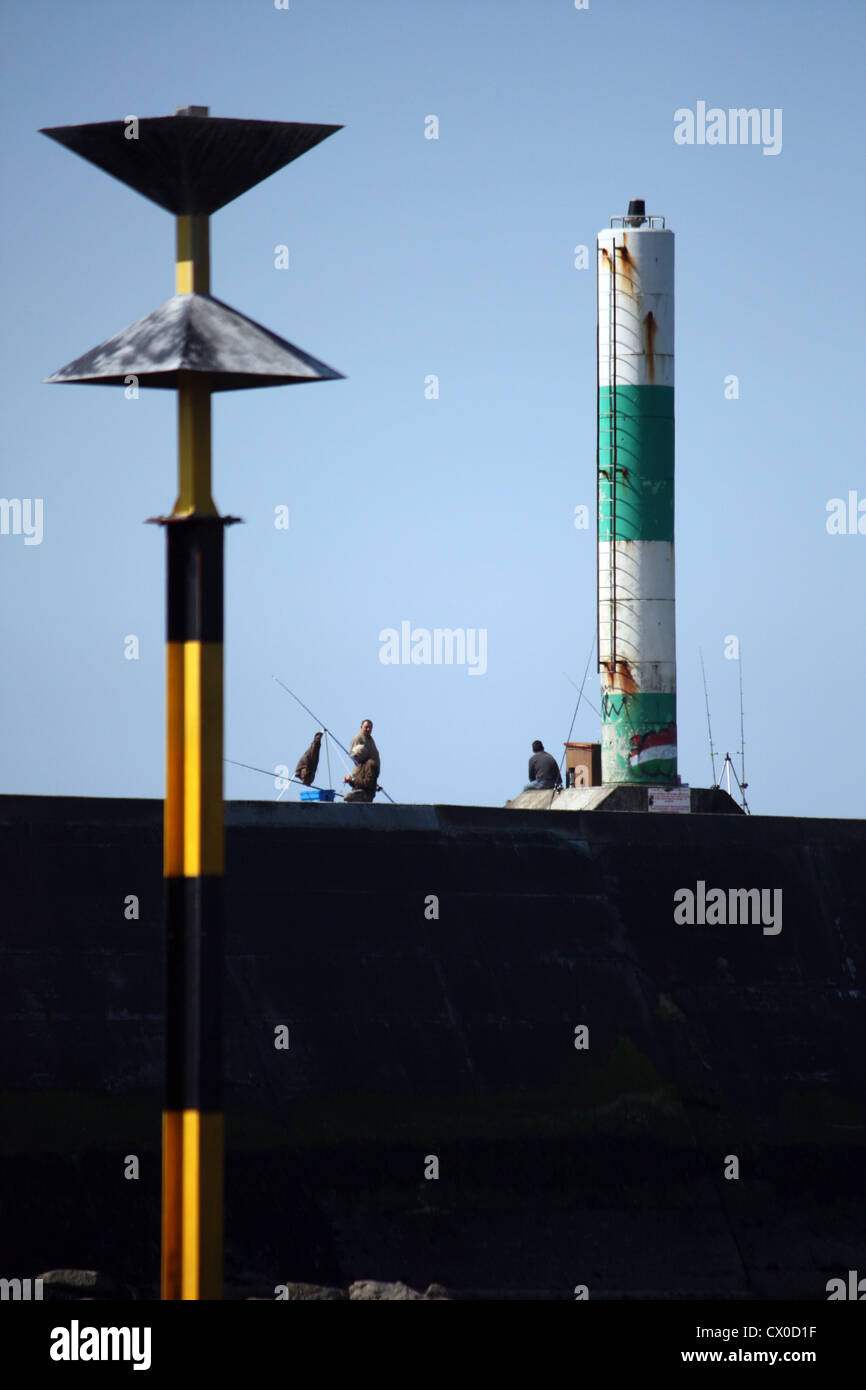 Fishing off sea wall hi-res stock photography and images - Alamy