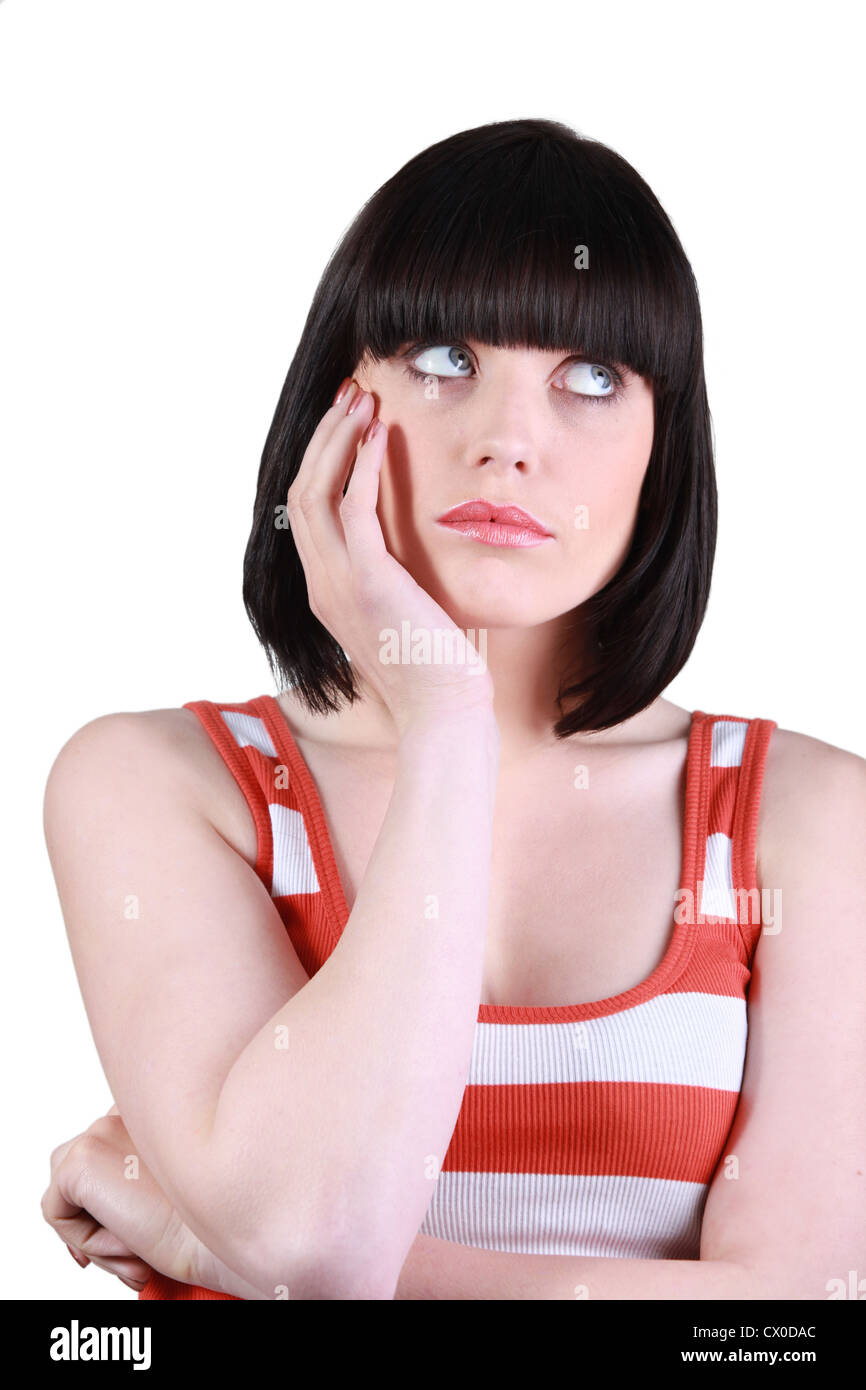 A pensive young woman Stock Photo - Alamy