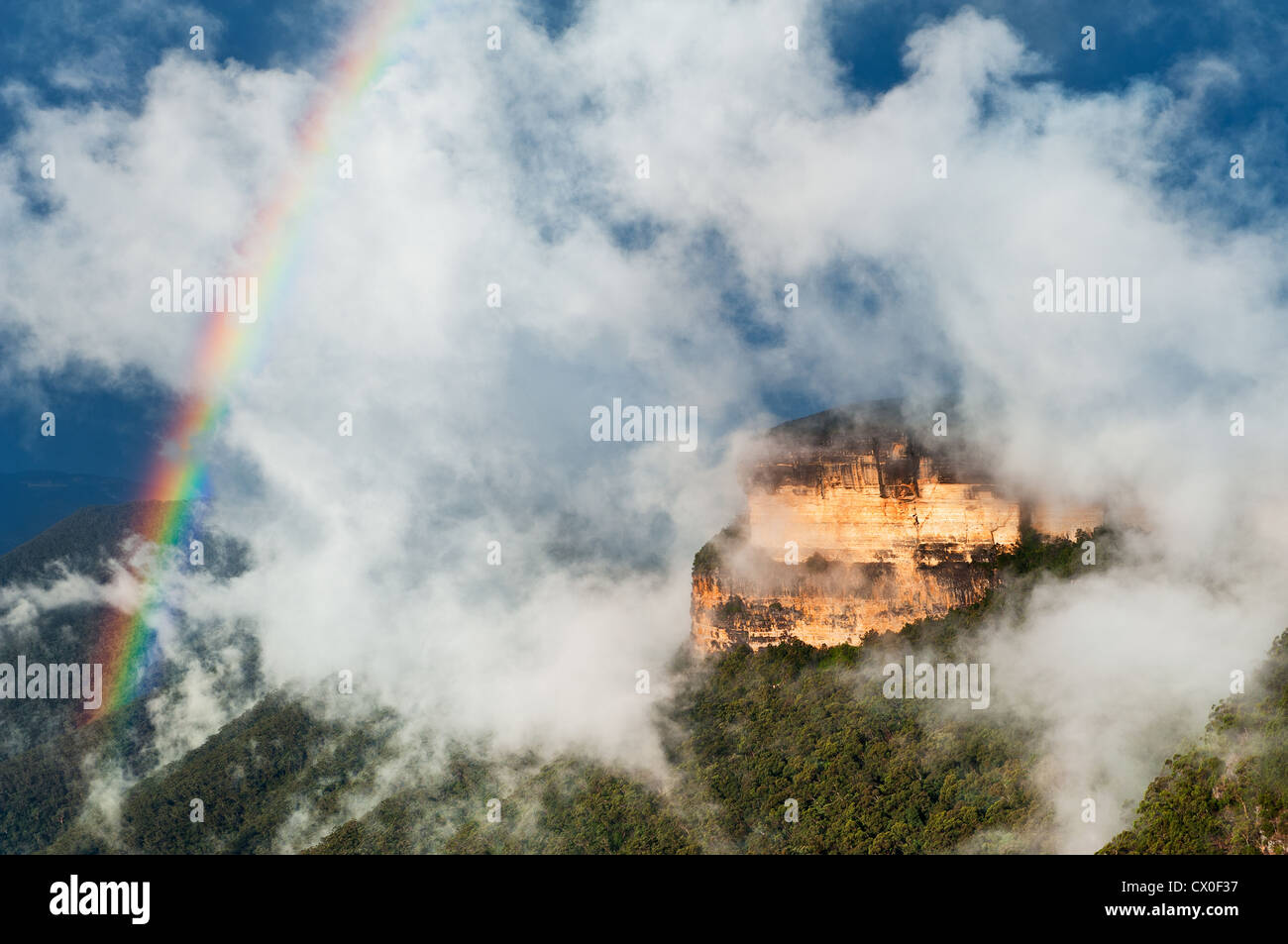 Mountain landscape with rainbow after a thunderstorm hi-res stock ...