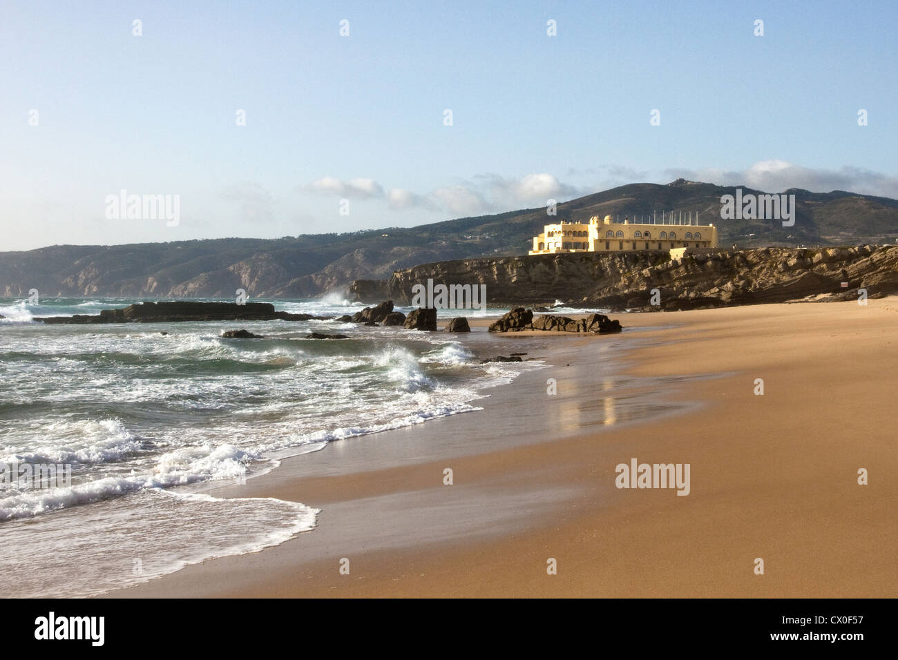 Praia da Cresmina with Fortaleza do Guincho (old fort - now a hotel) (and Guincho beach beyond ...