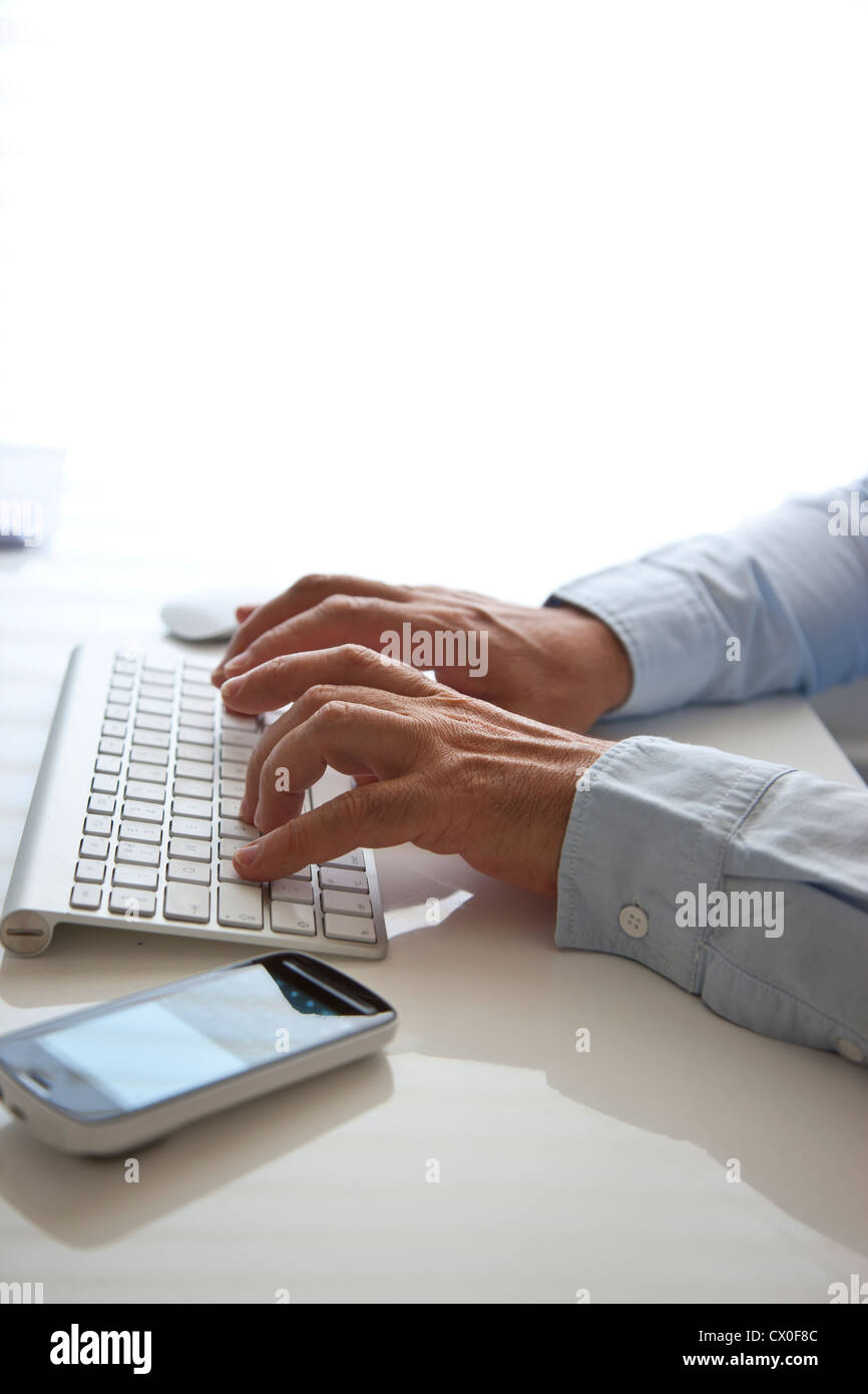 Man's Hands Typing on Keyboard Stock Photo - Alamy