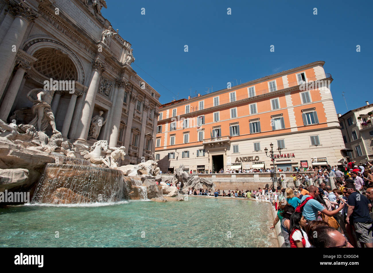 Tourists crowd the Trevi Fountain in Rome Italy Stock Photo - Alamy