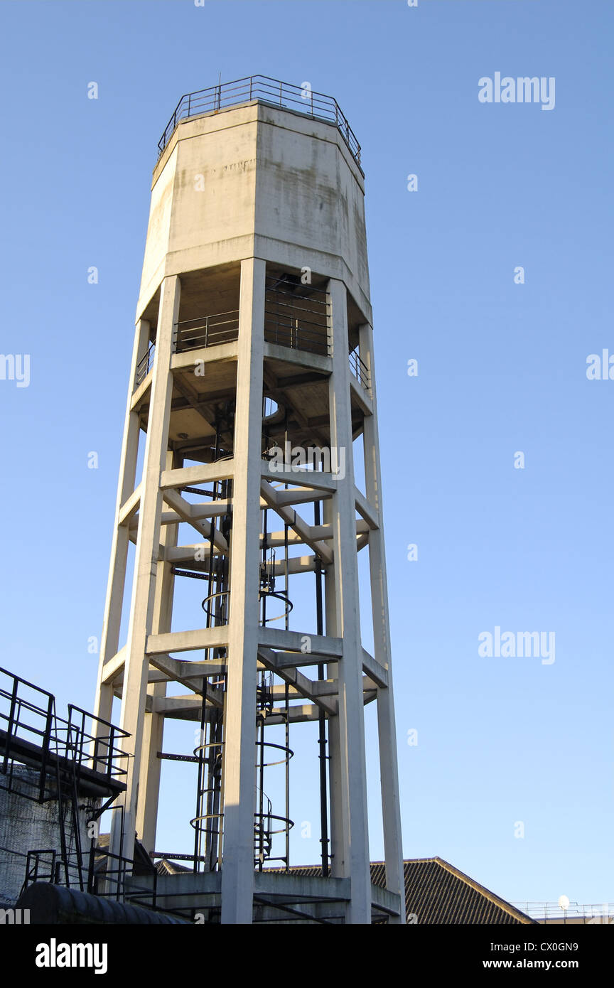 Concrete water tower against a clear blue sky Stock Photo - Alamy