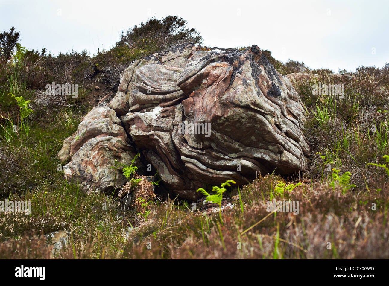 Strange face-like rock formations on the hillside overlooking Lower ...