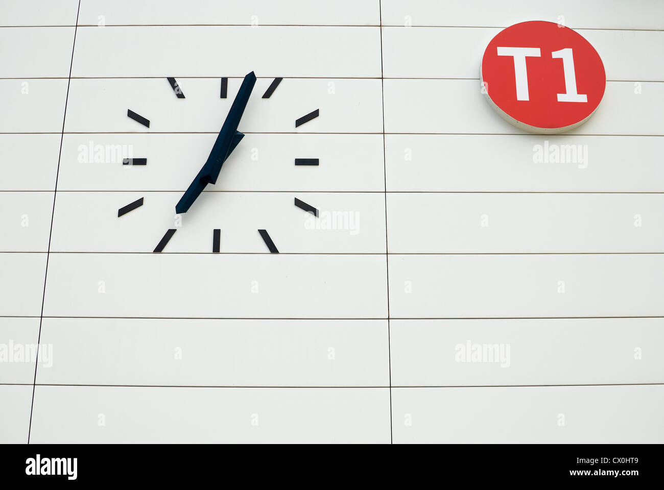 Terminal sign and clock in an airport hall Stock Photo - Alamy