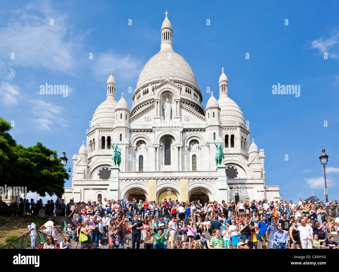 Crowds of tourists around the Sacre Coeur Paris France EU Europe Stock ...