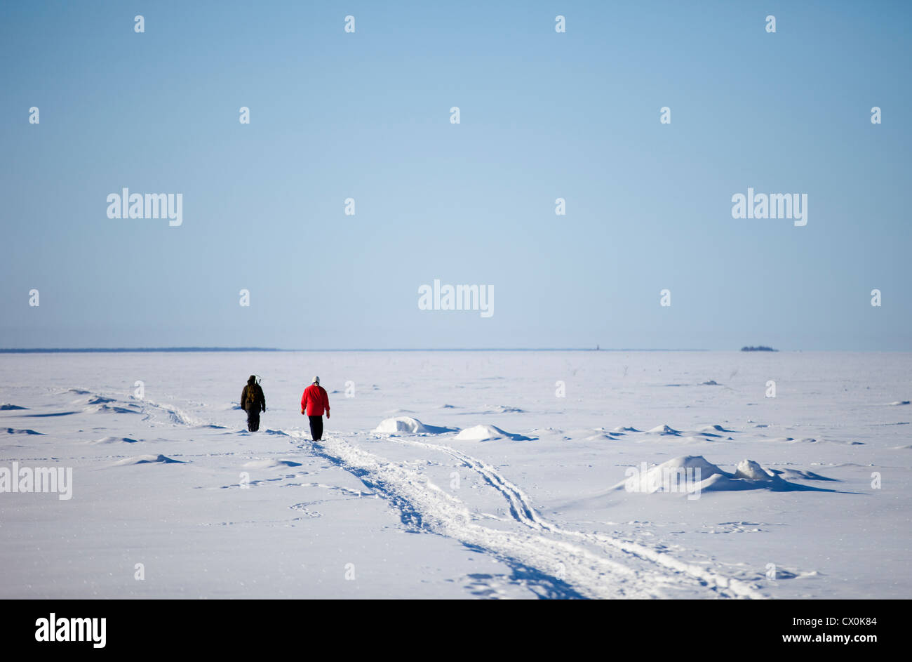 Fishermen walking at sea ice at Gulf Of Bothnia , Finland Stock Photo ...
