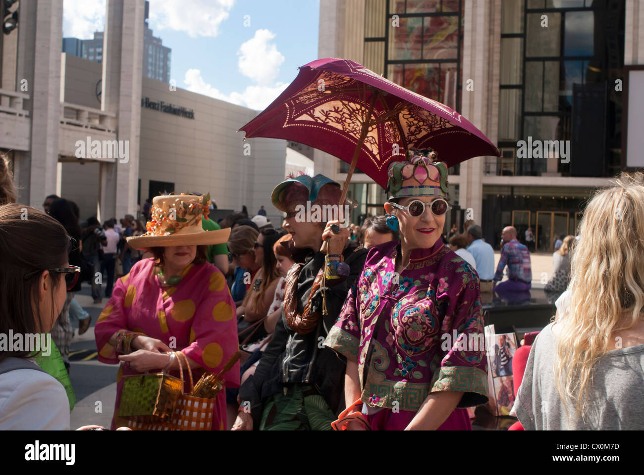 Crowds of fashionistas create a fashion scene outside of the Spring ...