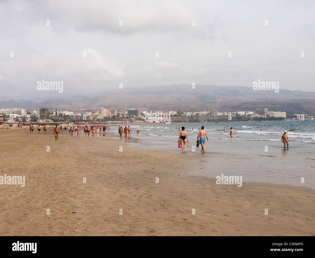 A long morning stroll is enjoyed along the beach between Playa Ingles ...