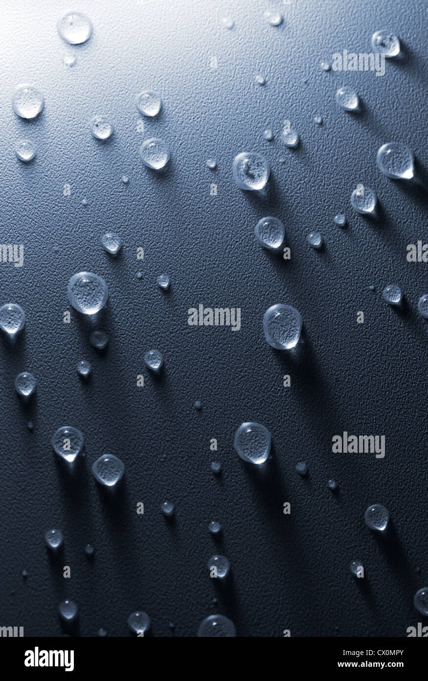 Water drops on the embossed surface of tension ceiling Stock Photo - Alamy