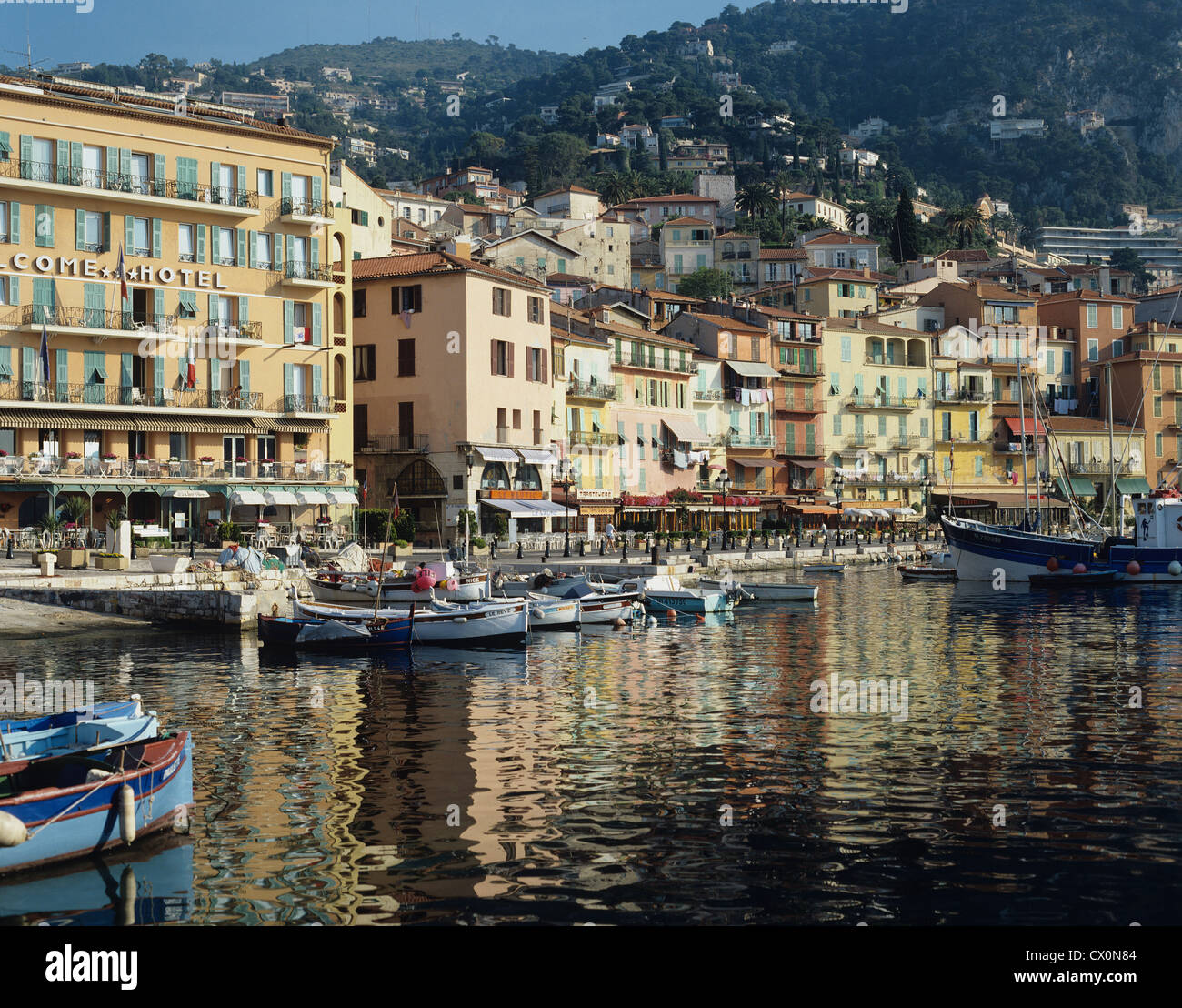 France. Cannes. Boats in the old harbour and waterfront buildings Stock ...