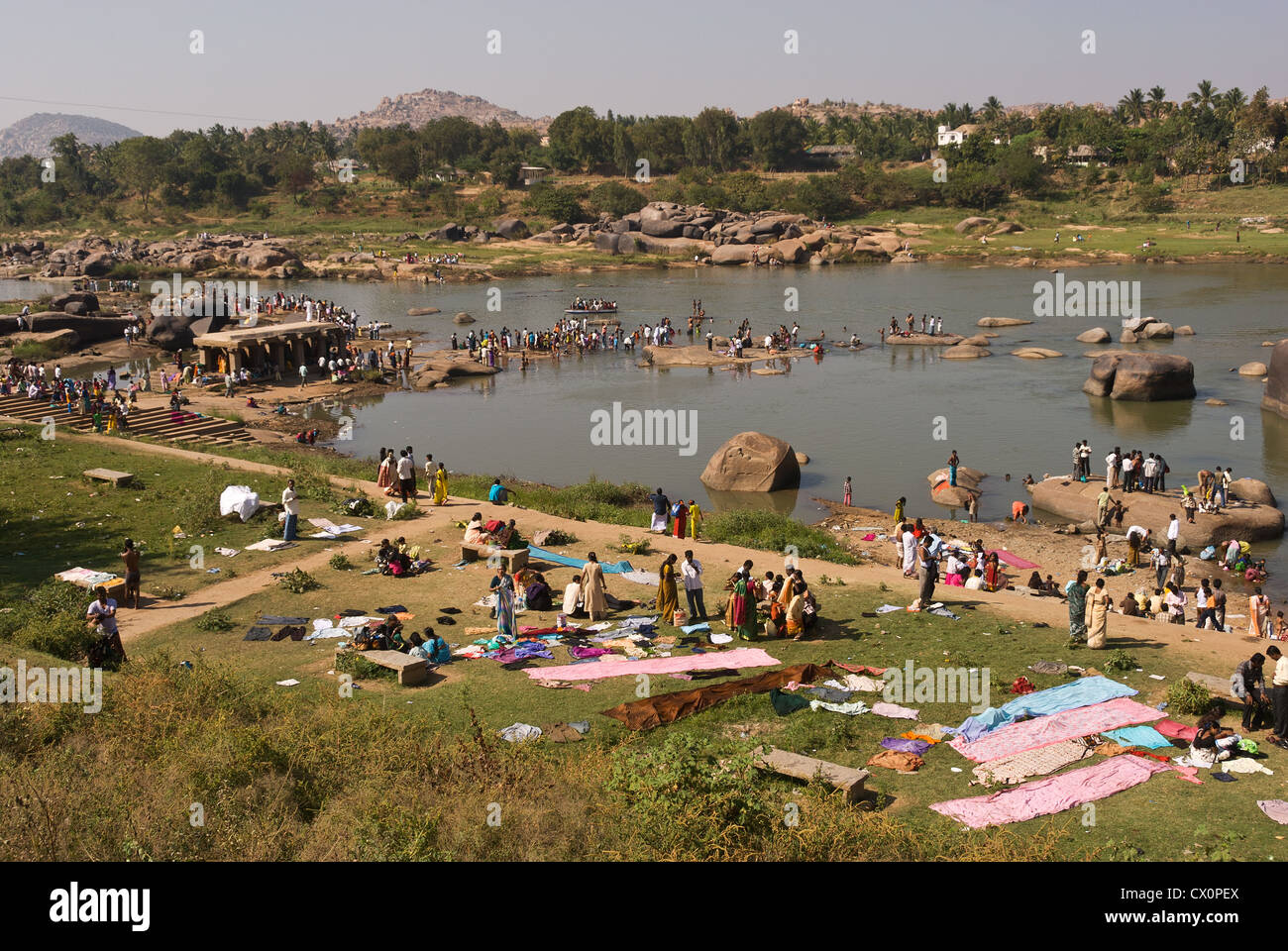 Elk201-2476 India, Karnataka, Hampi, Tungabhadra River, bathers for ...