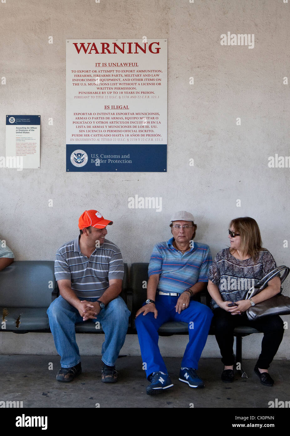Group of mostly Mexican citizens wait for vehicles to be inspected at ...