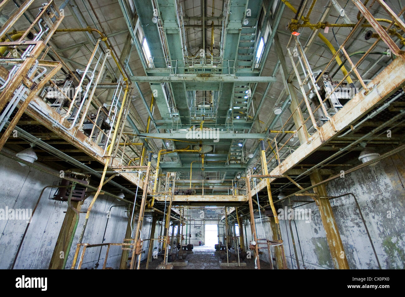 A large industrial building with lots of pipes in an explosives factory ...