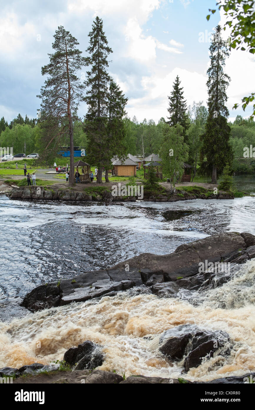 Lowland waterfall in Ruskeala in the Republic of Karelia, Russia. View ...