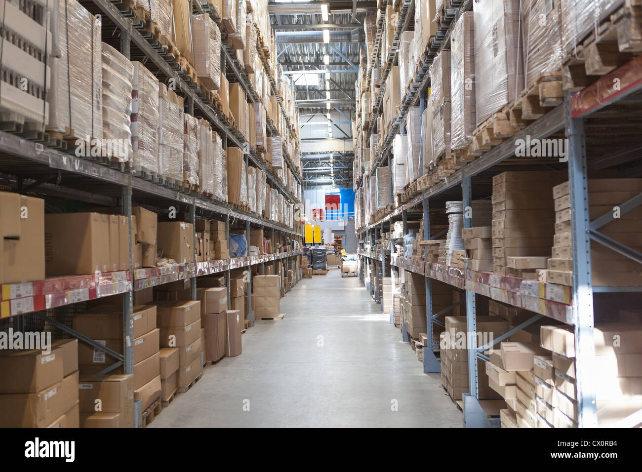 Warehouse with goods in retail merchandise shop with cardboard boxes ...