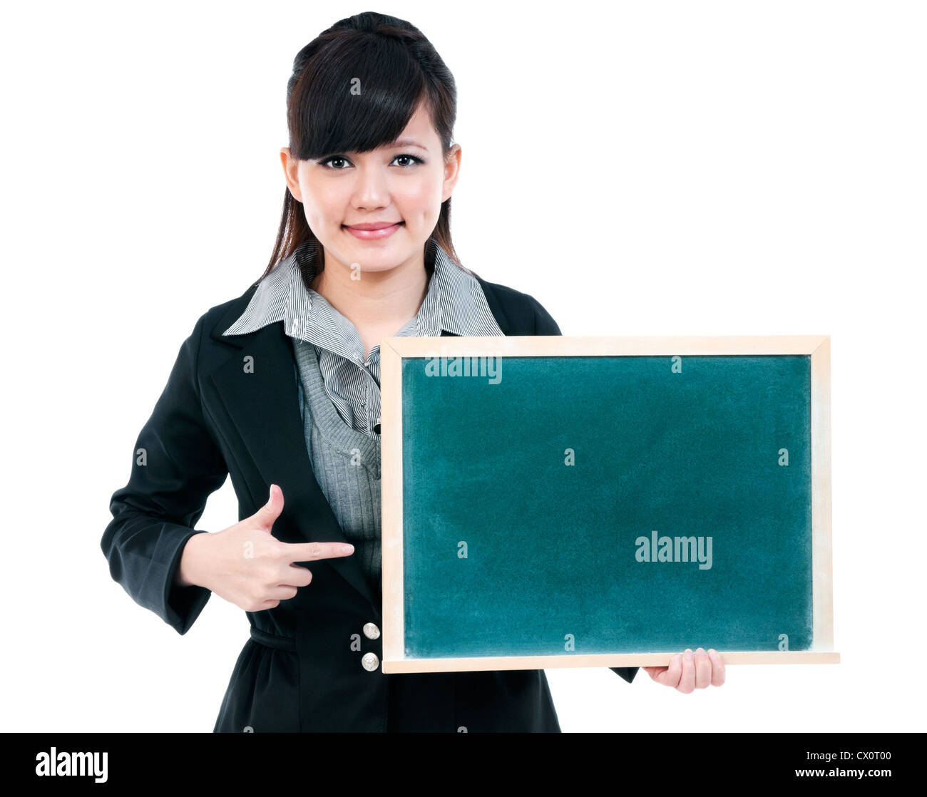 Young businesswoman pointing at blackboard Stock Photo - Alamy