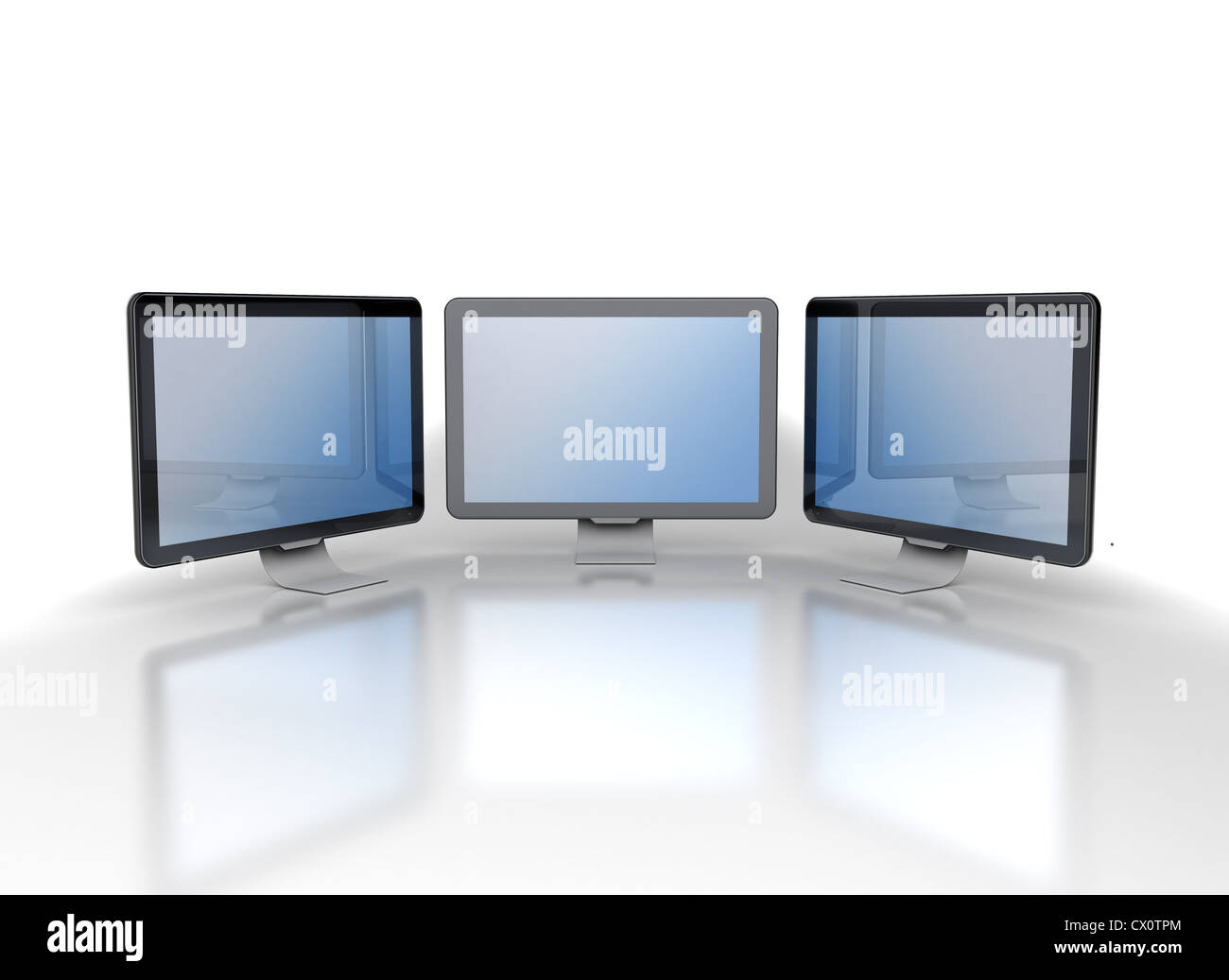 Three computer monitors on white background Stock Photo - Alamy