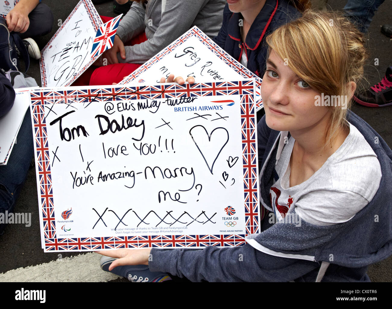 Girl Writing Message For The Athletes Victory Parade London 2012 Stock ...