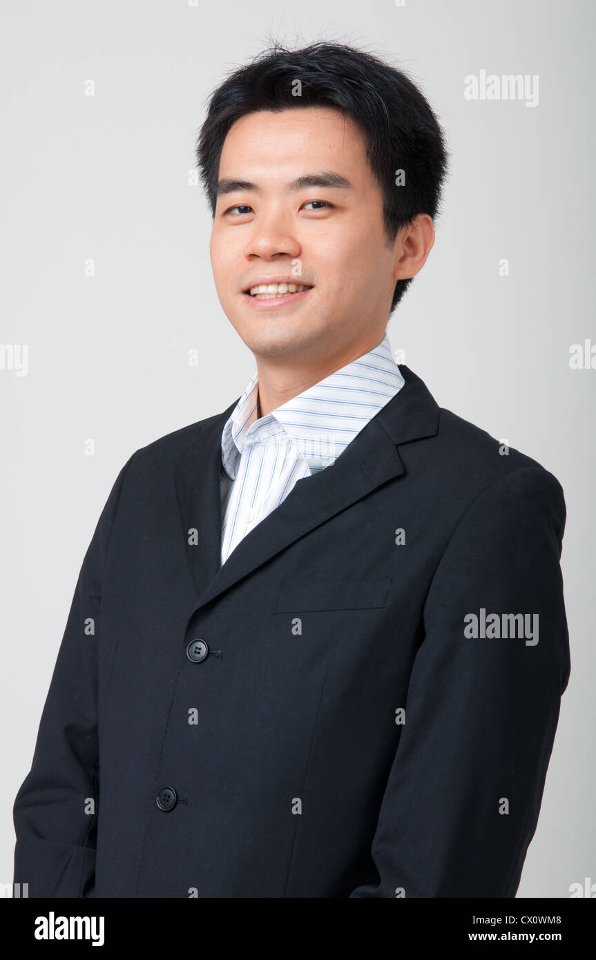 confident looking asian business man in a suit Stock Photo - Alamy