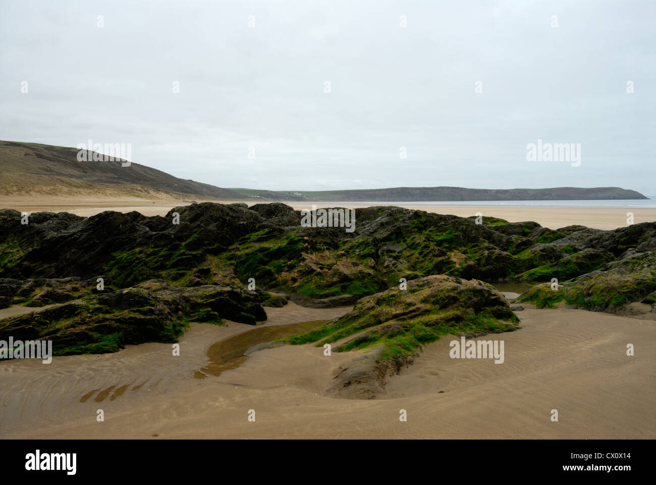 View of the sandy Bay and rocks at Woolacombe North Devon Stock Photo ...