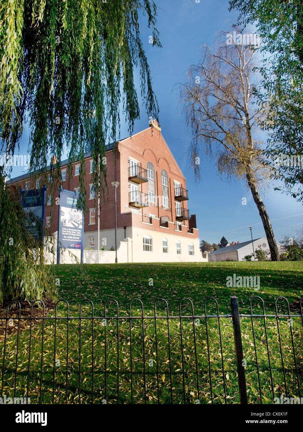 commercial building with fence Stock Photo - Alamy