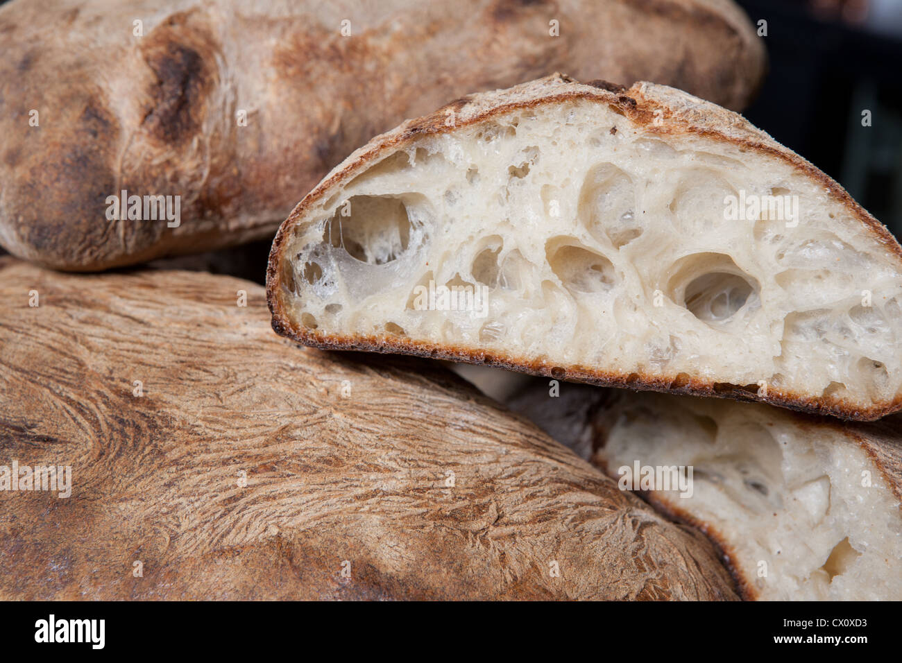 Color photograph of brick oven baked bread Stock Photo - Alamy