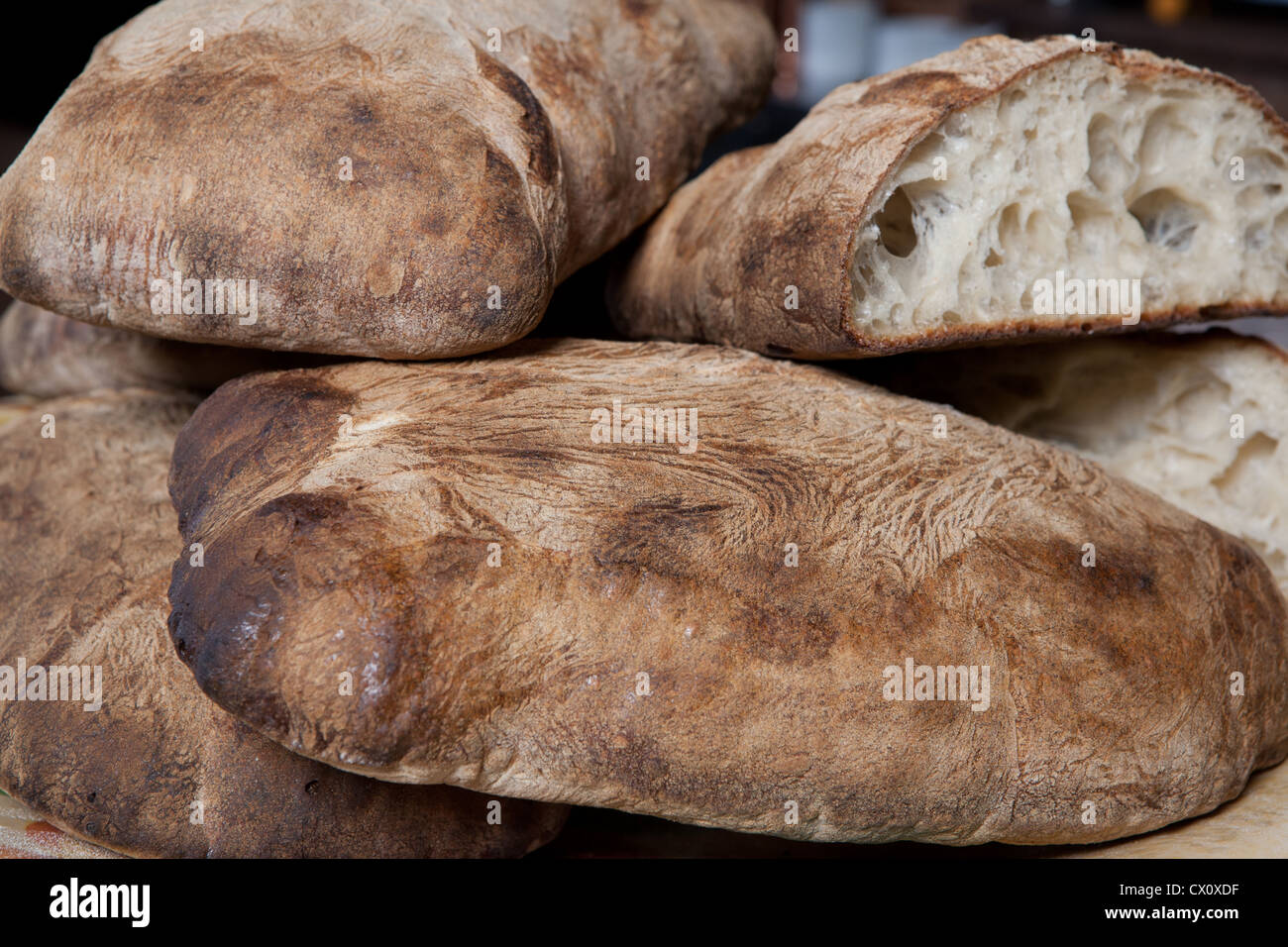 Color photograph of brick oven baked bread Stock Photo - Alamy
