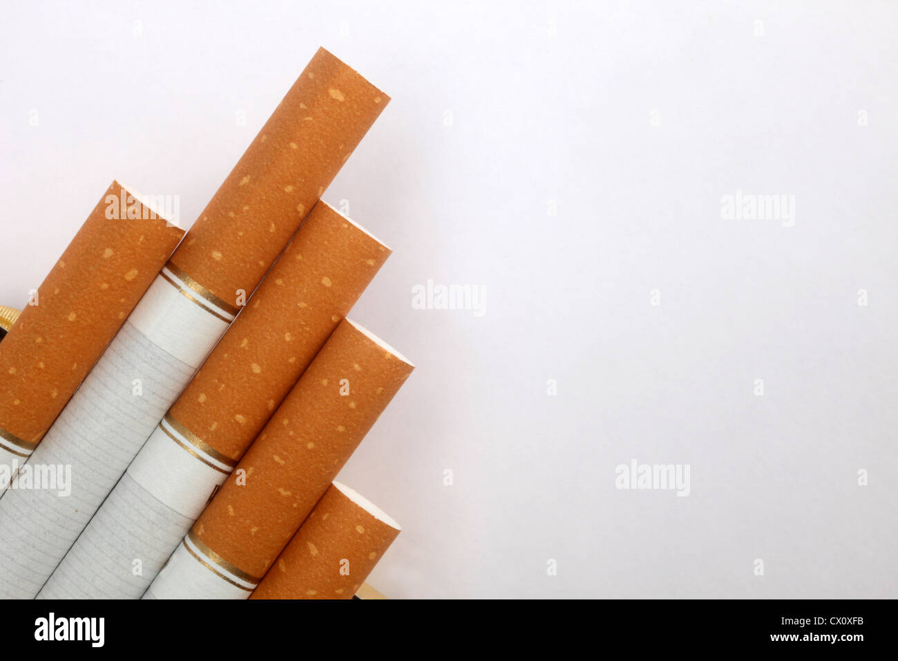Cigarettes isolated on a white background Stock Photo - Alamy