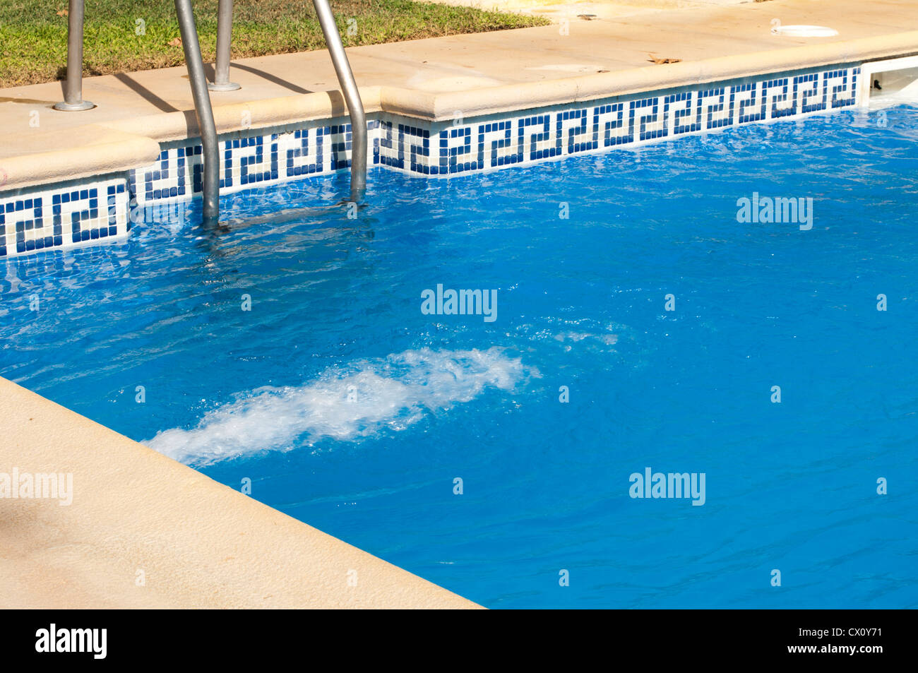 Swimming pool and pillar Stock Photo - Alamy