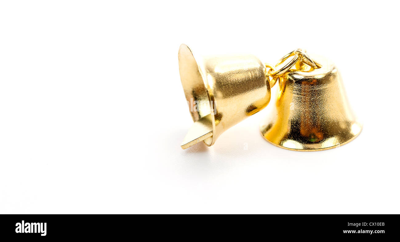 Golden bell isolate on white background Stock Photo - Alamy