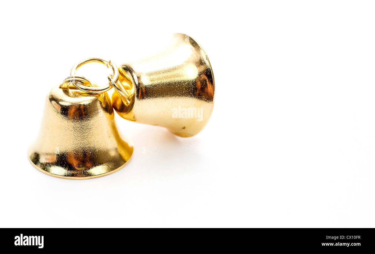 Golden bell isolate on white background Stock Photo - Alamy