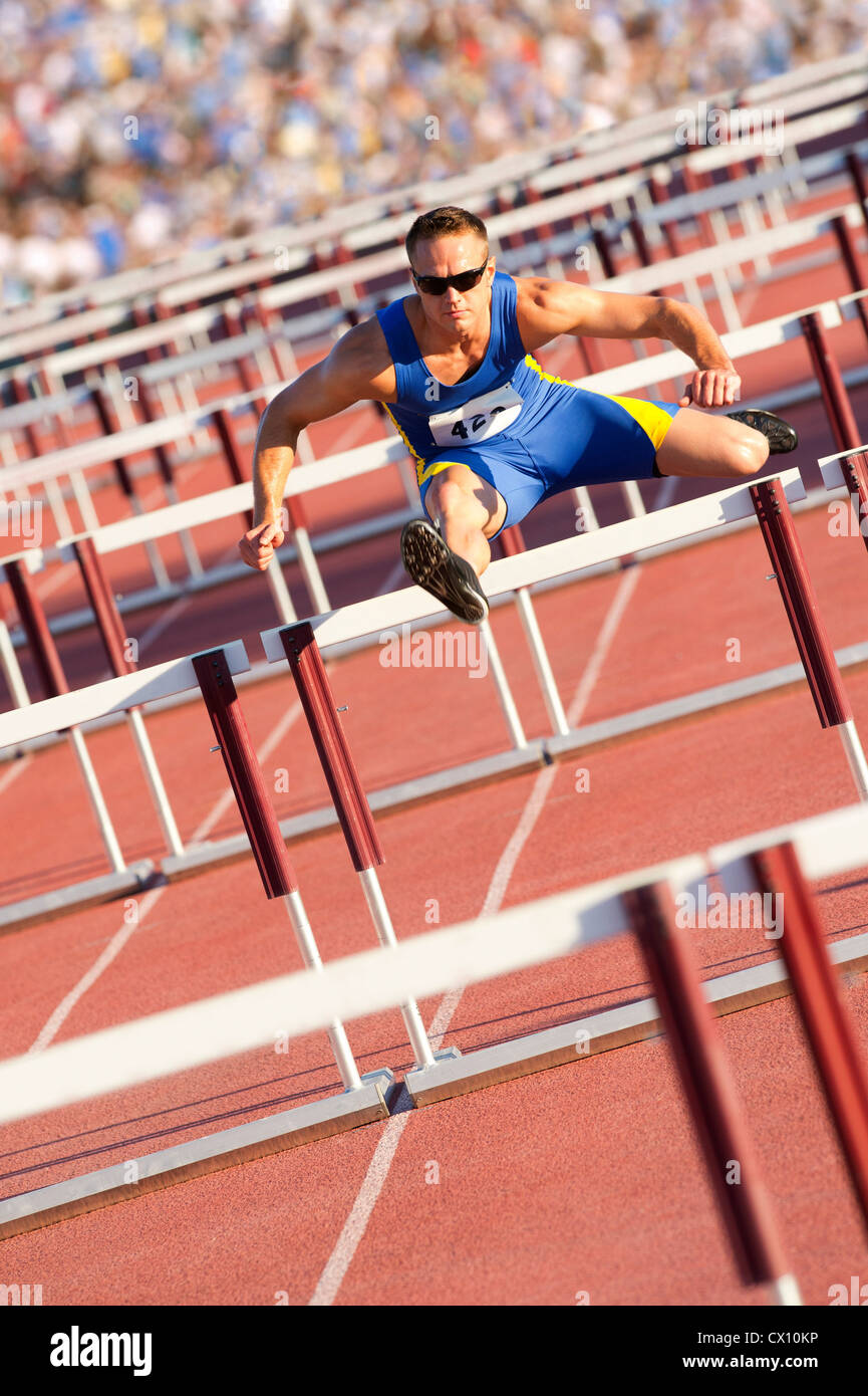 Person moving the hurdles hi-res stock photography and images - Alamy