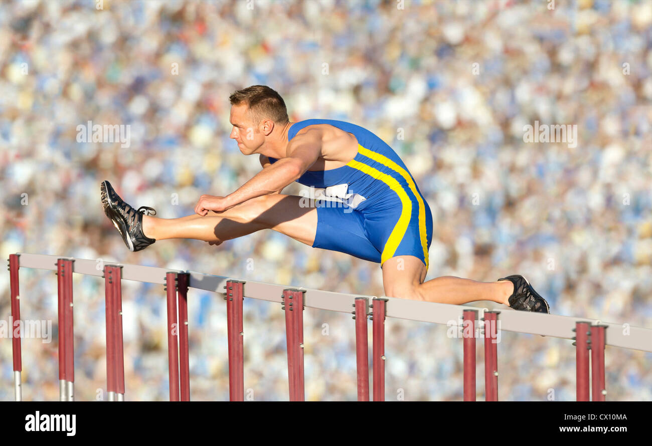 Male hurdler cleaning hurdle Stock Photo - Alamy