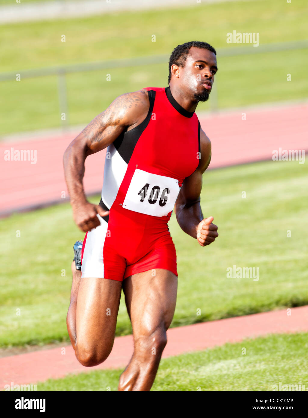 Male athlete running on track Stock Photo - Alamy