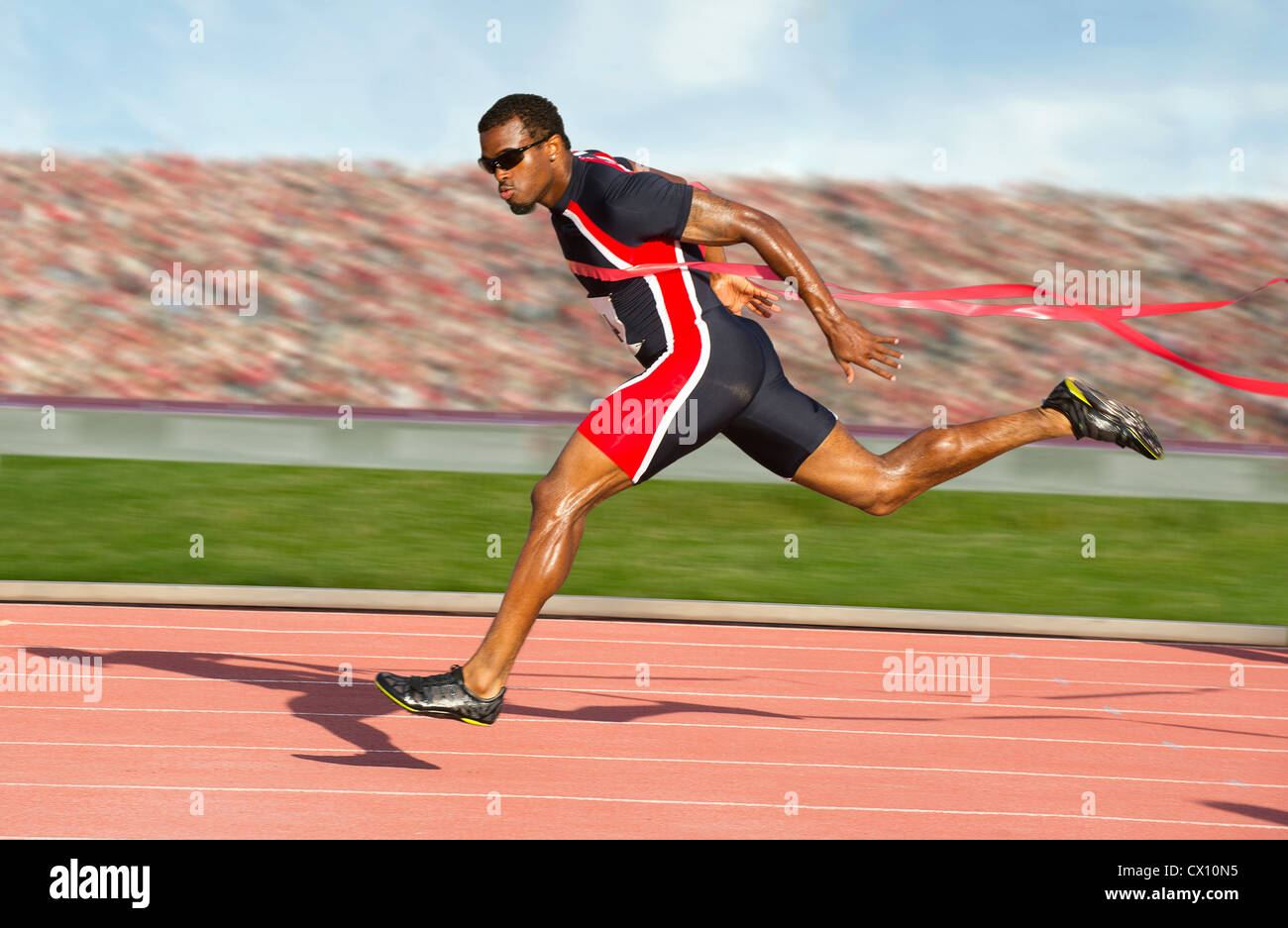 Sprinter crossing finish line hi-res stock photography and images - Alamy
