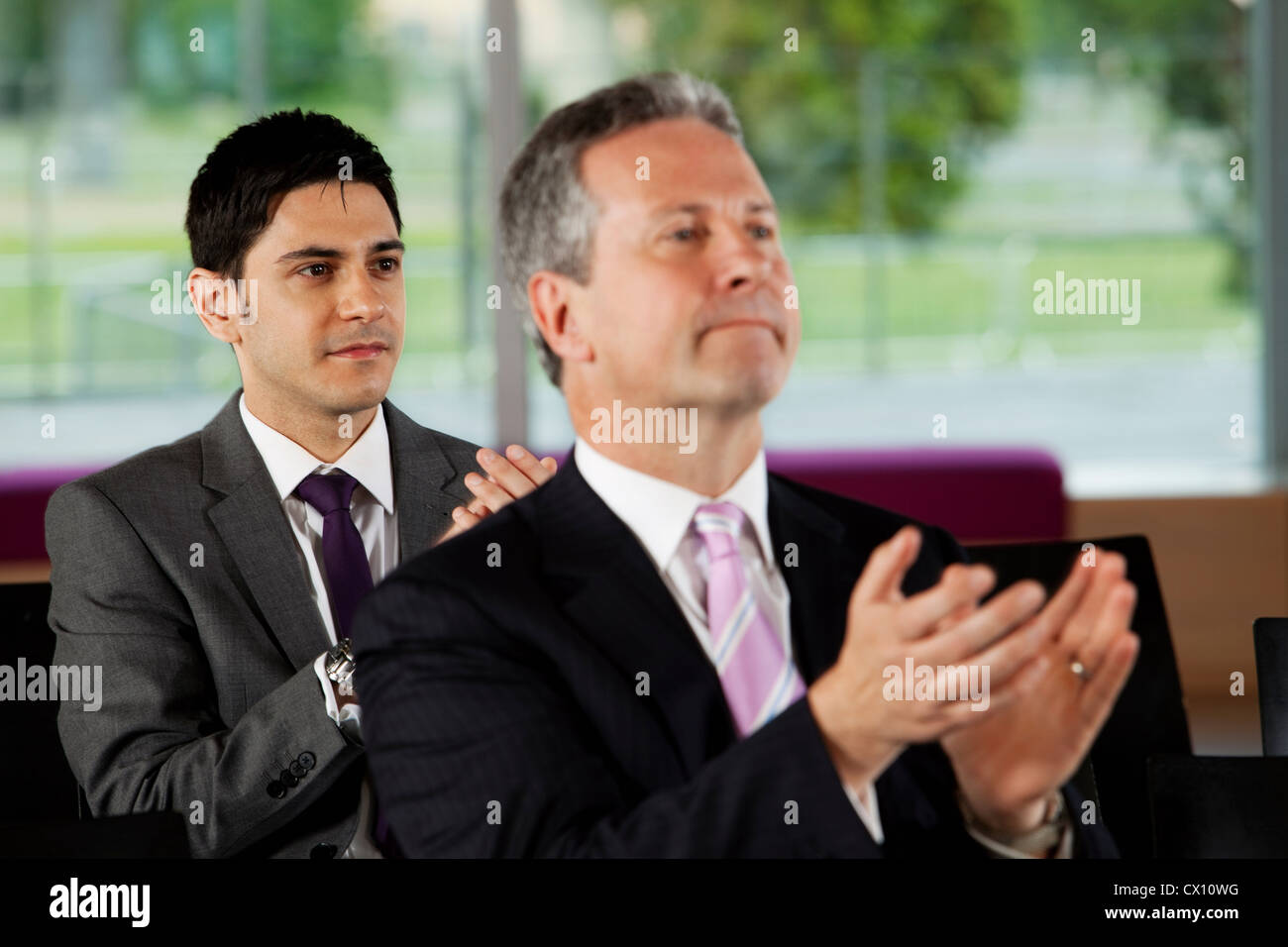 Two men clapping hi-res stock photography and images - Alamy