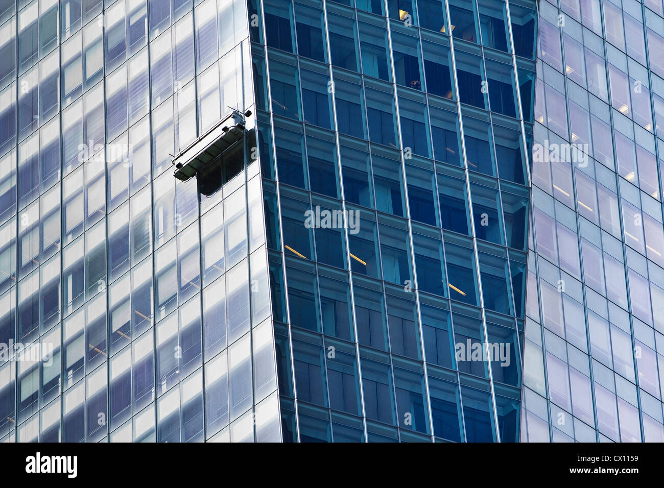 Window cleaner scaffold on side of skyscraper Stock Photo - Alamy