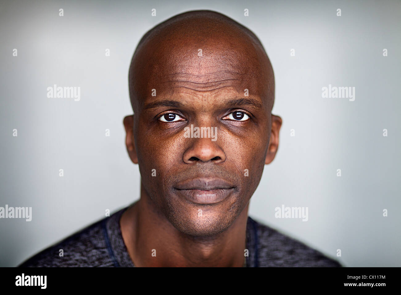 Portrait of a bald man looking at camera Stock Photo - Alamy