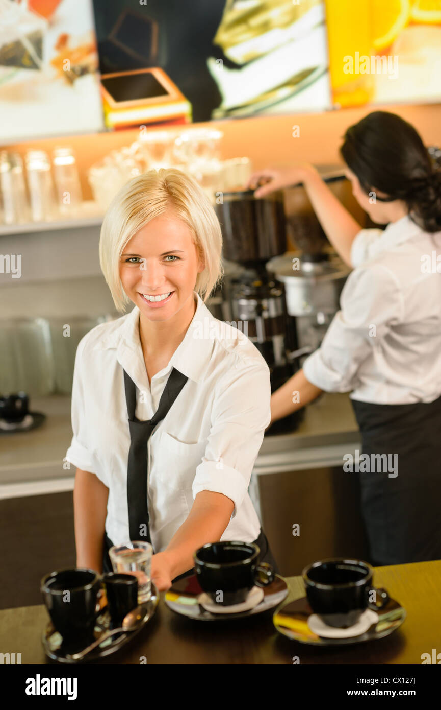 Waitress serving coffee cups making espresso woman cafe bar working ...