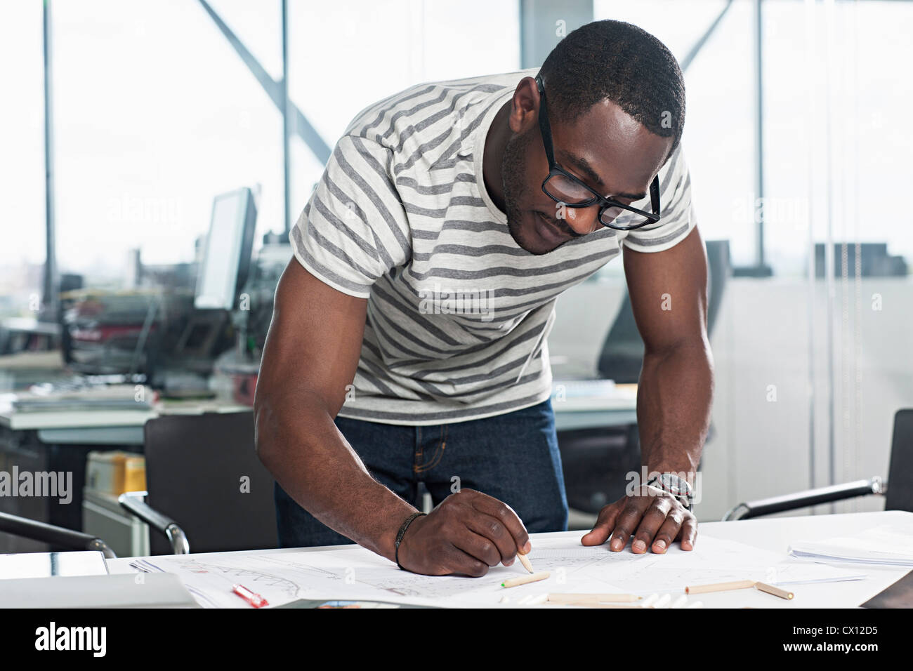 Man planning in office Stock Photo - Alamy